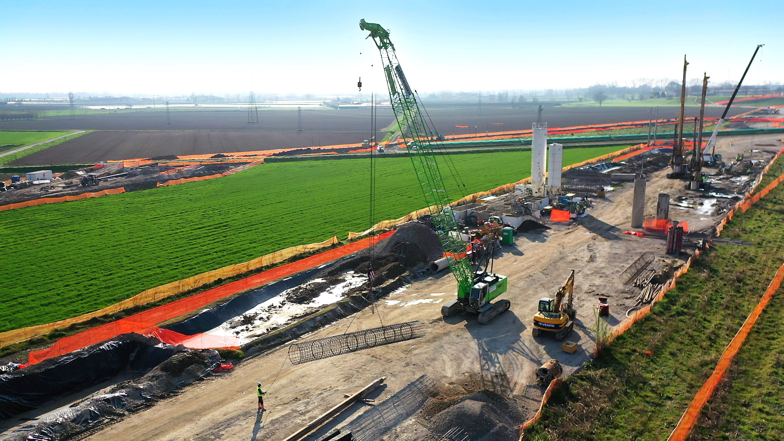 Foundation work for railroad line extension with SENNEBOGEN cranes