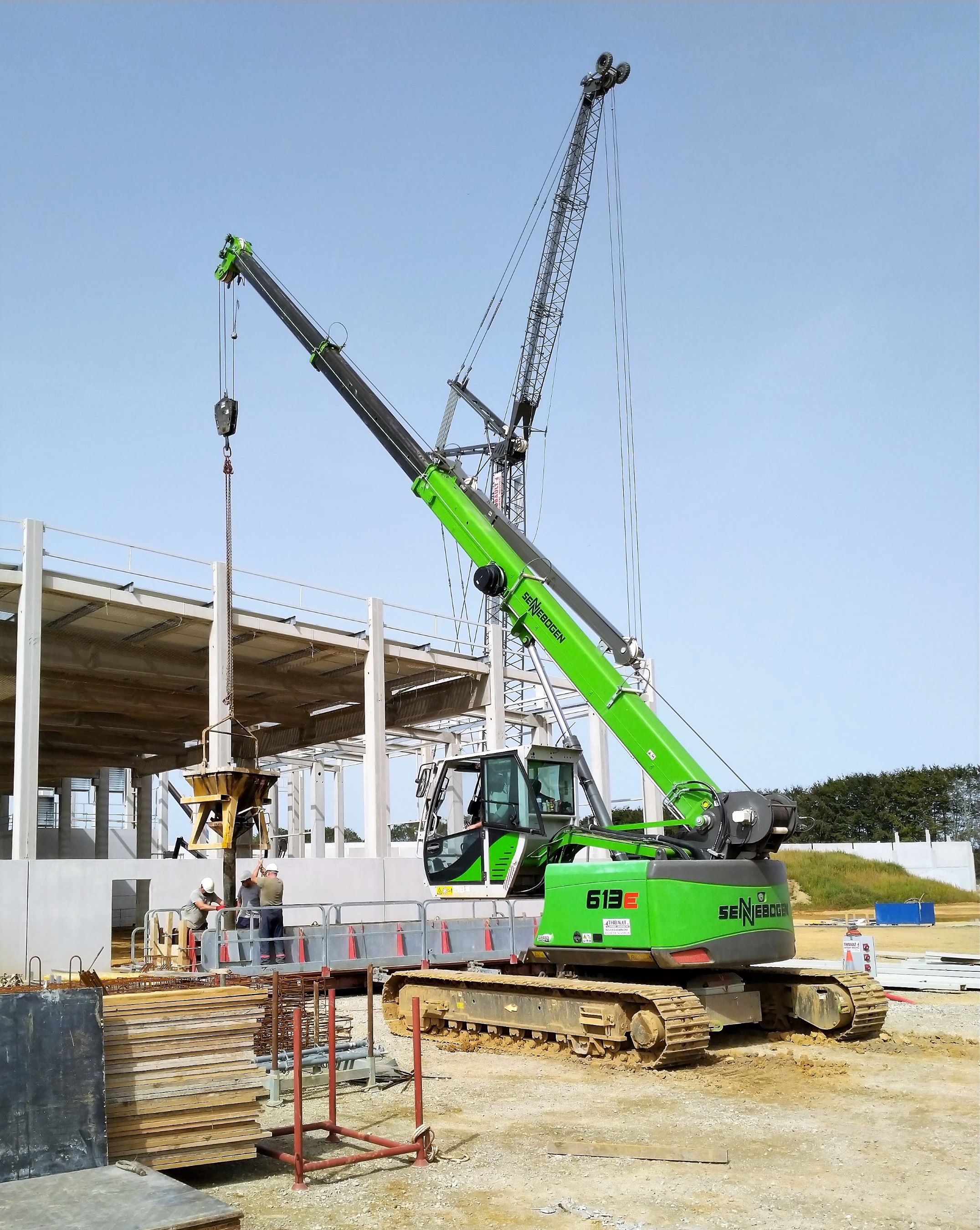 Heavy lifting work during the construction of complex industrial buildings