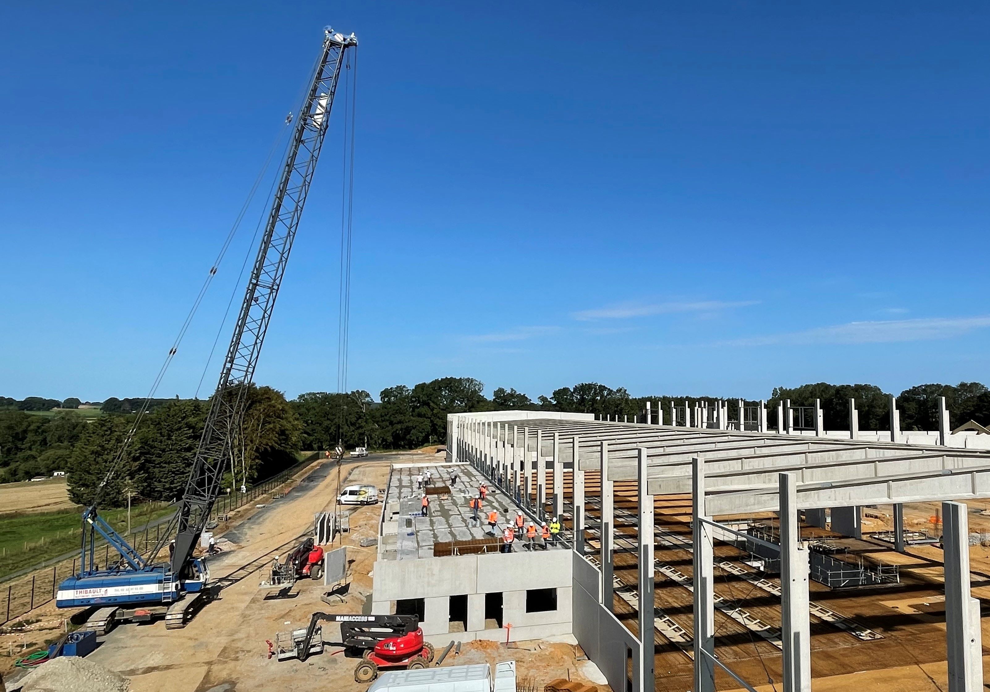 Heavy lifting work during the construction of complex industrial buildings
