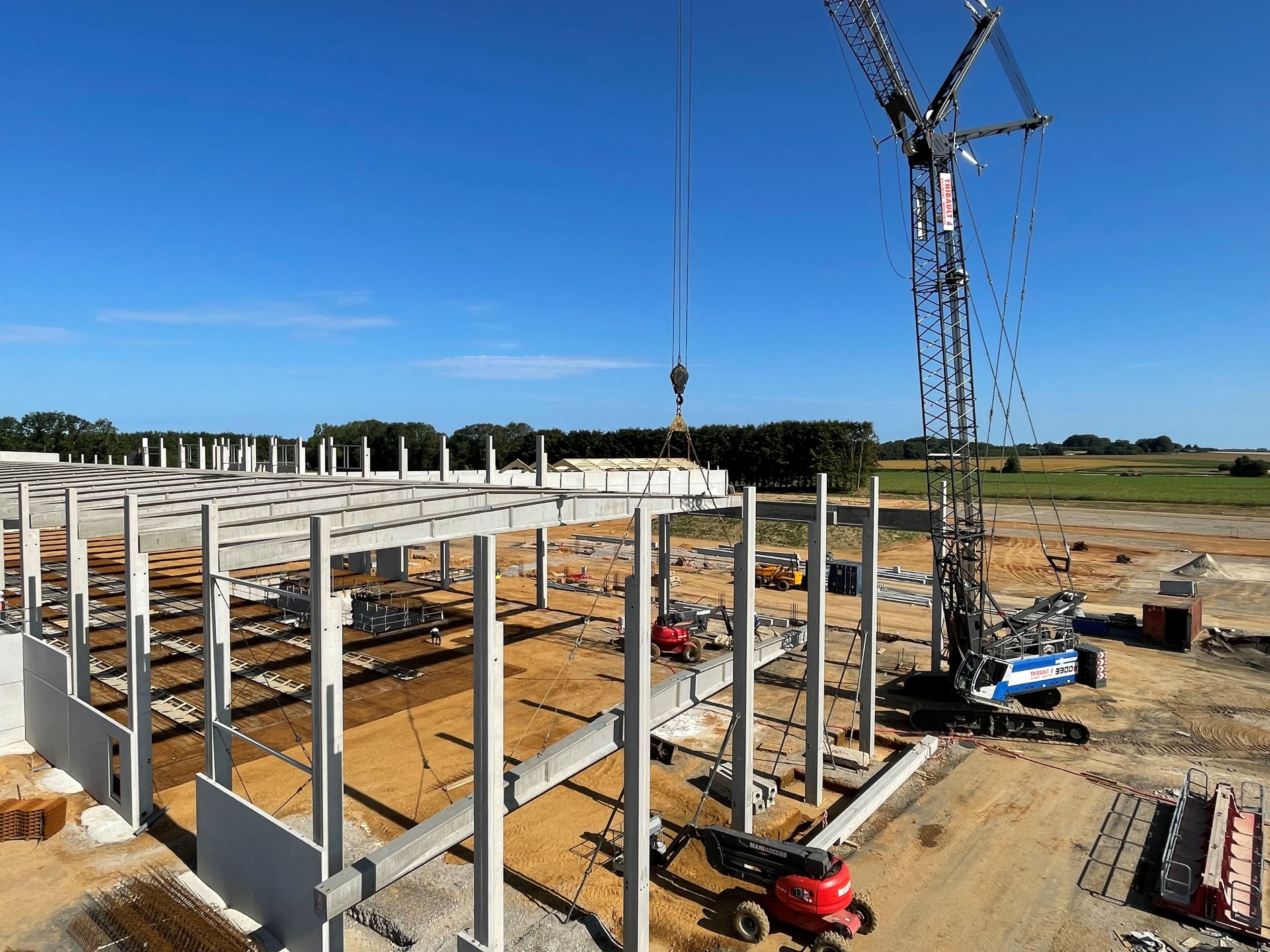 Heavy lifting work during the construction of complex industrial buildings