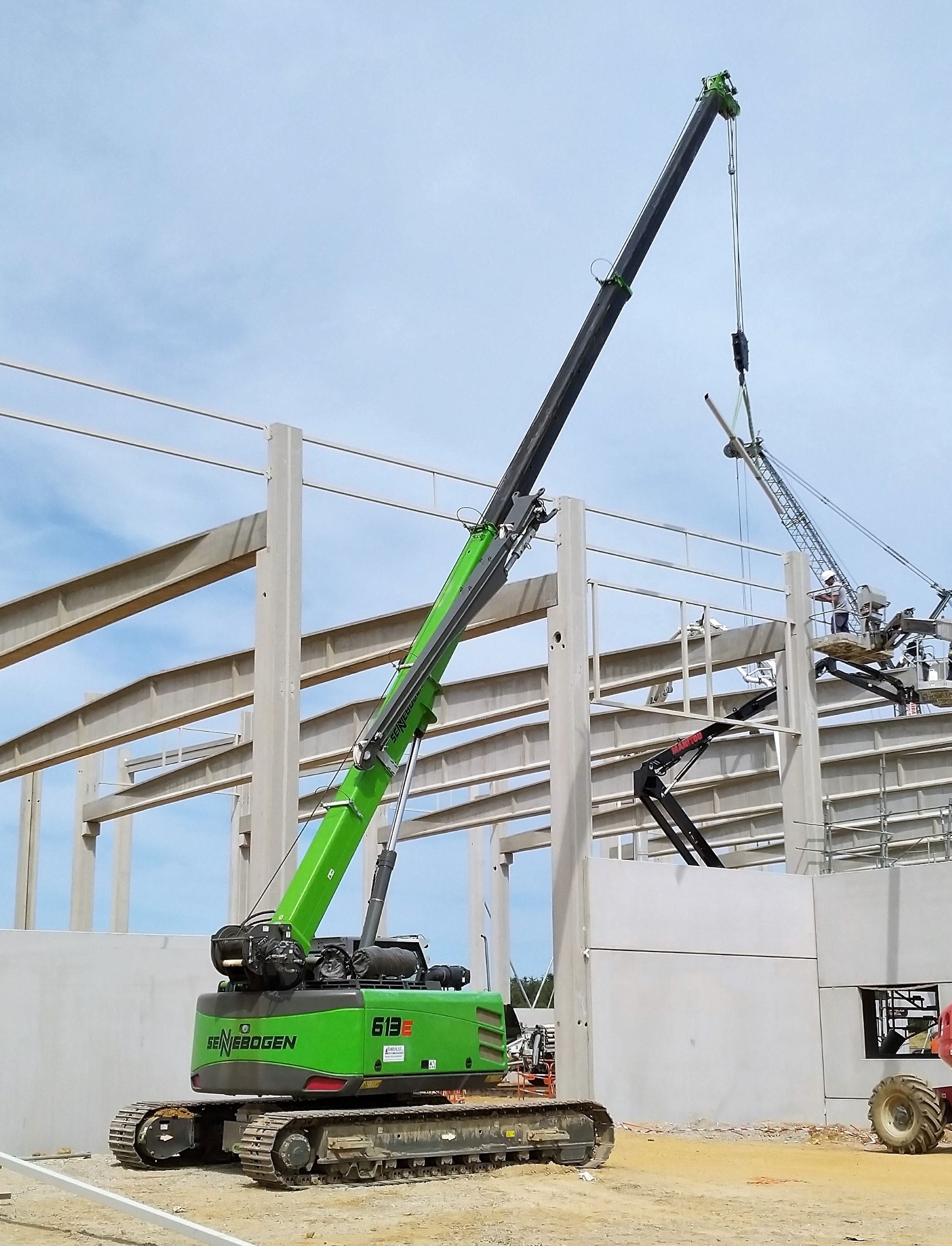 Heavy lifting work during the construction of complex industrial buildings
