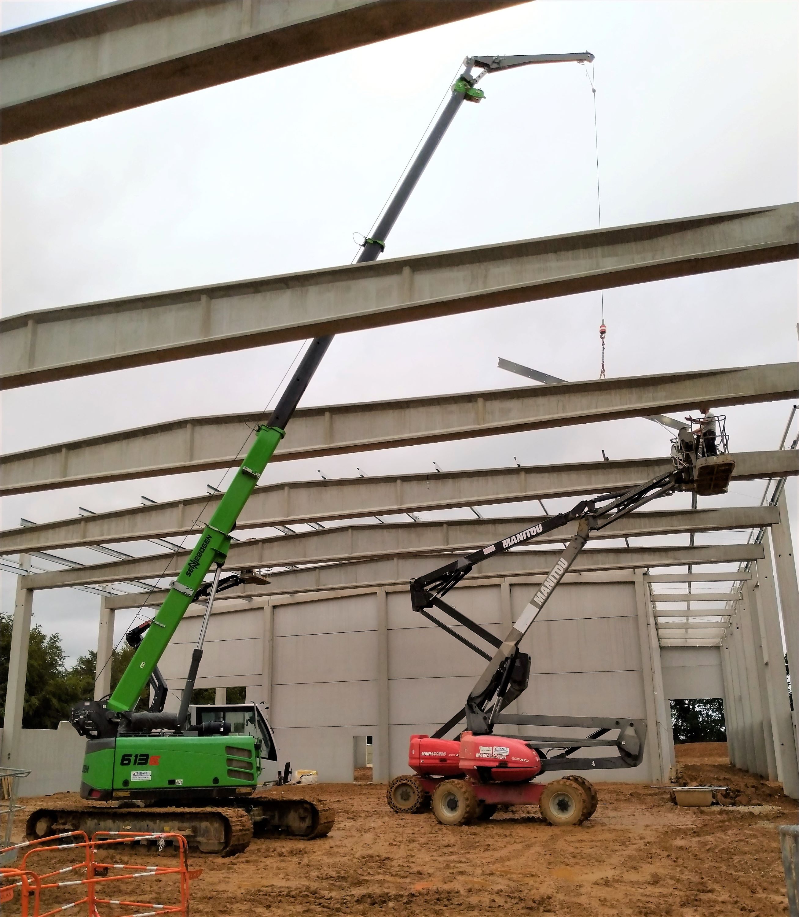 Heavy lifting work during the construction of complex industrial buildings