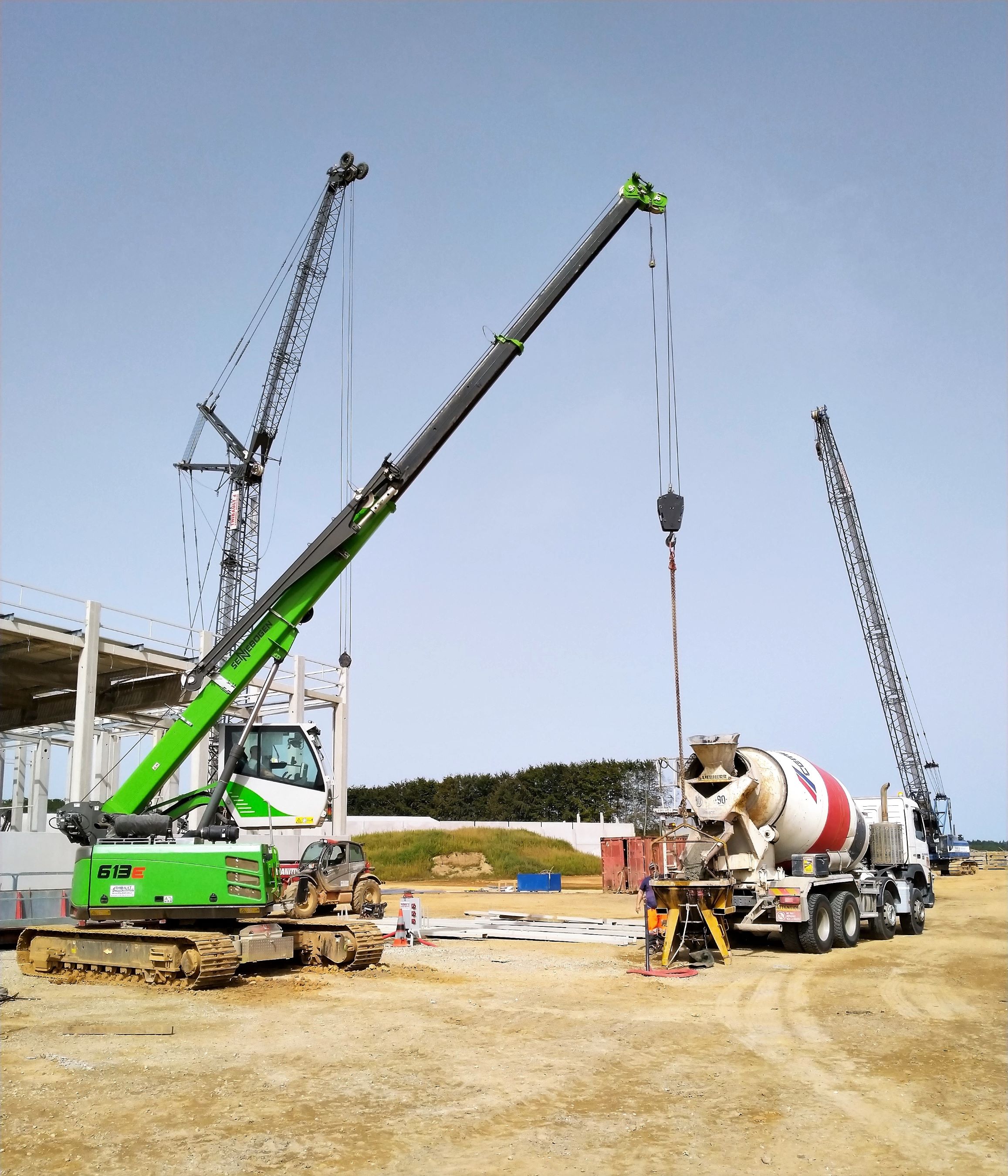 Heavy lifting work during the construction of complex industrial buildings
