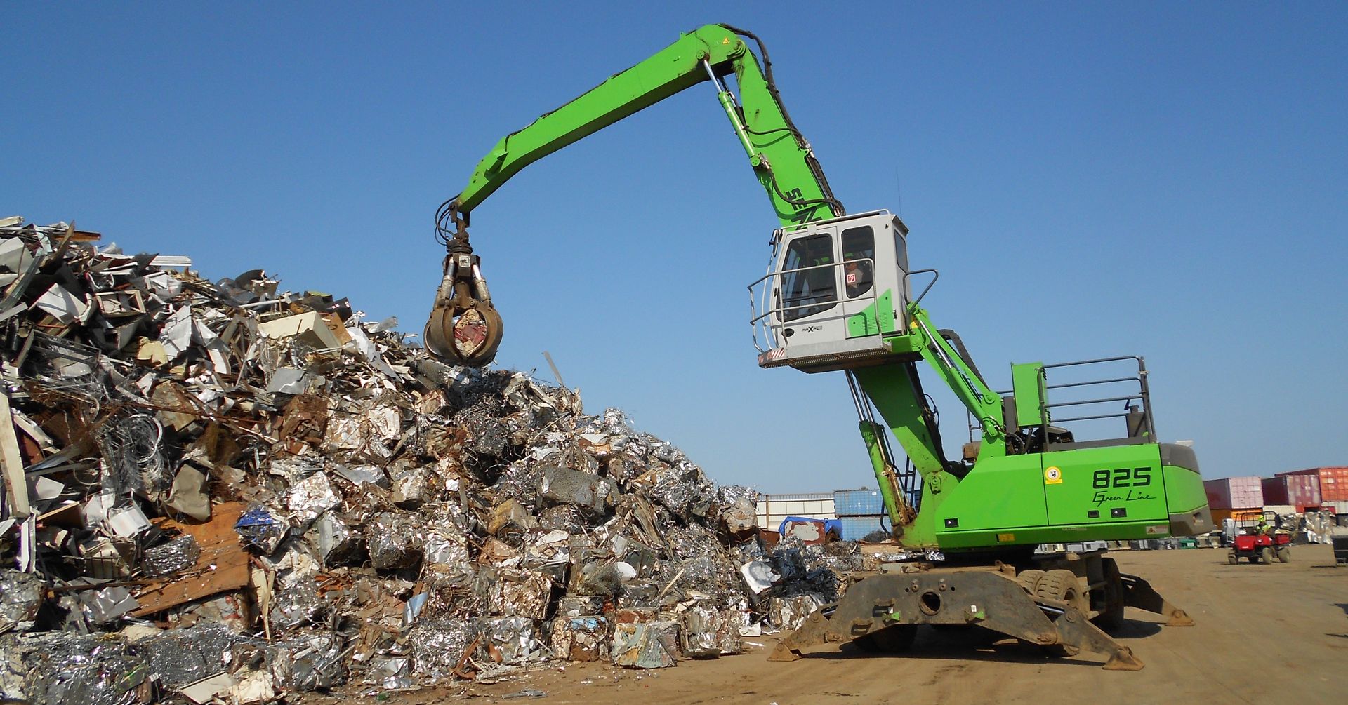 ALCO IRON & METAL RELIES ON TWO NEW SENNEBOGEN 825 MATERIAL HANDLERS