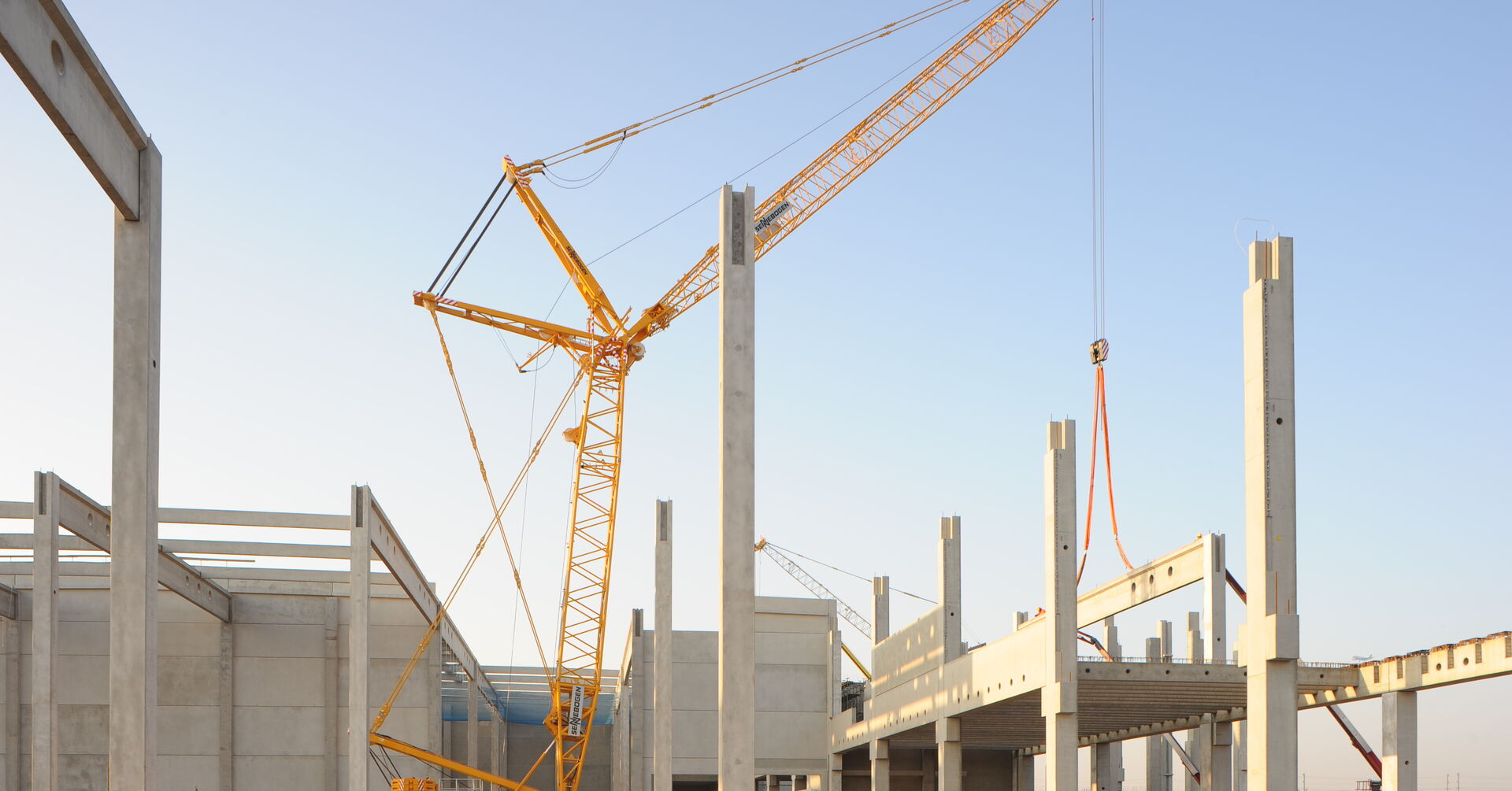 Two SENNEBOGEN Crawler Cranes used in the construction of a new ...