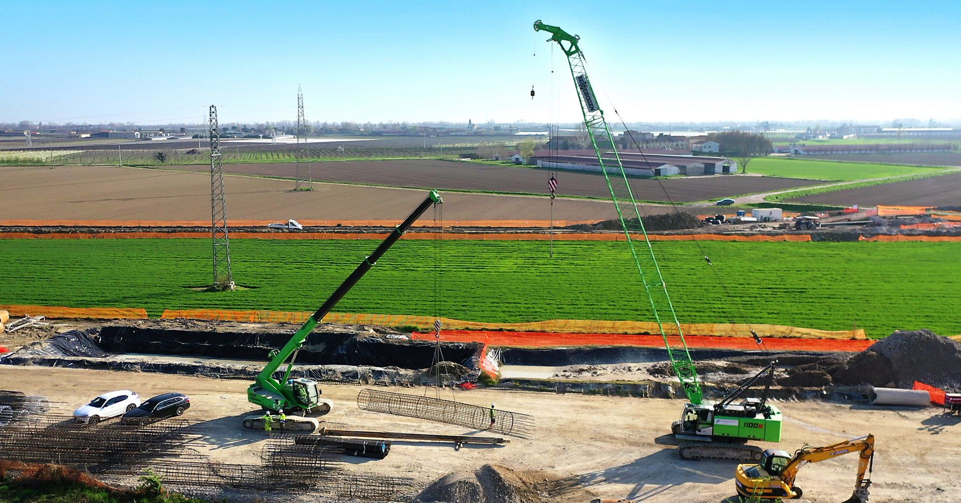 Foundation work for railroad line extension with SENNEBOGEN cranes