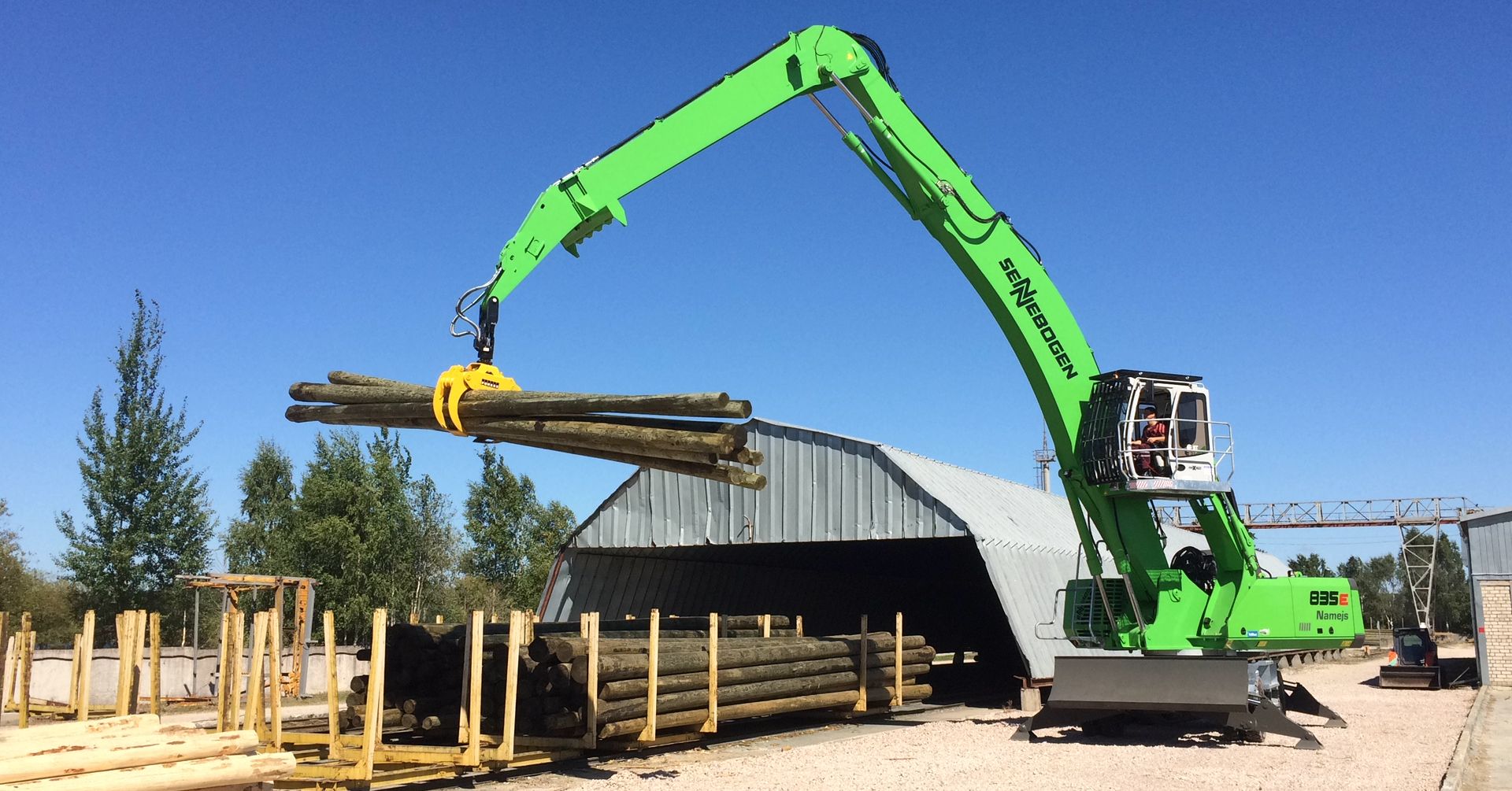 Material handler for loading and transporting utility poles: Two ...